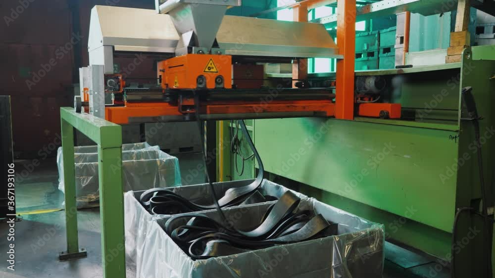 Automated machine produces rubber band, conveyor line, chemical ...