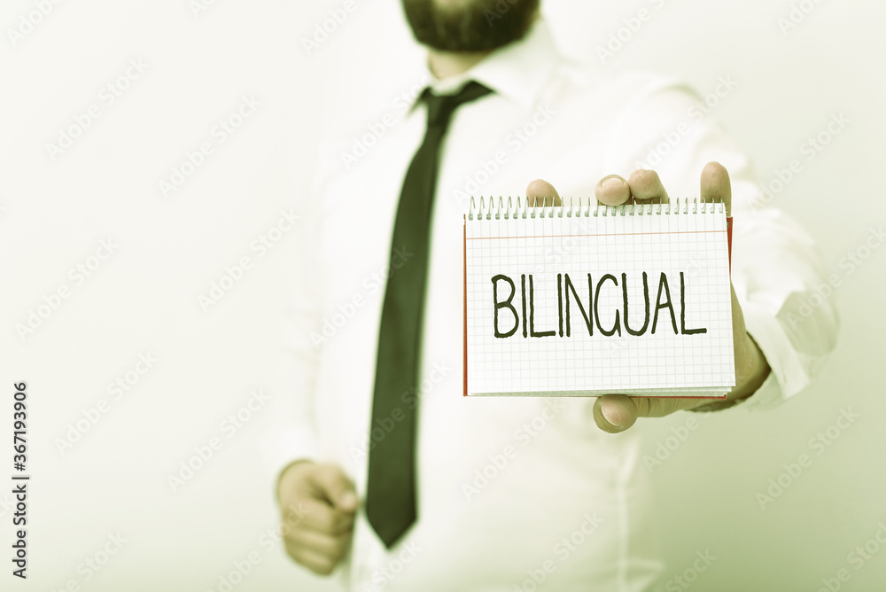 Handwriting text writing Bilingual. Conceptual photo using or able to ...