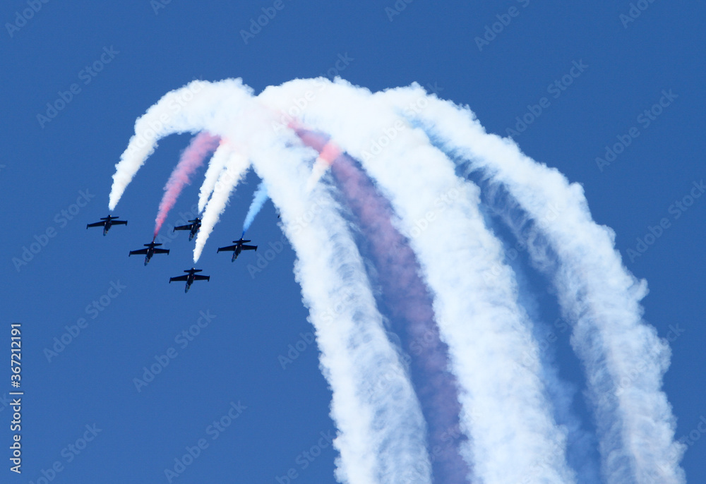 A jet Flying Team, single seat jet airplanes flying in close formation ...