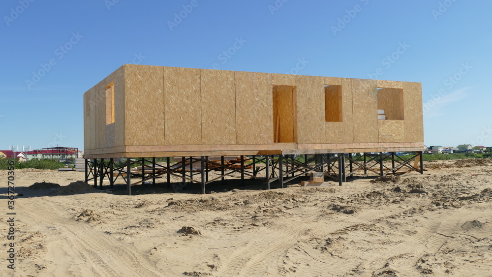 house made of OSB slabs with foam Stock Photo | Adobe Stock