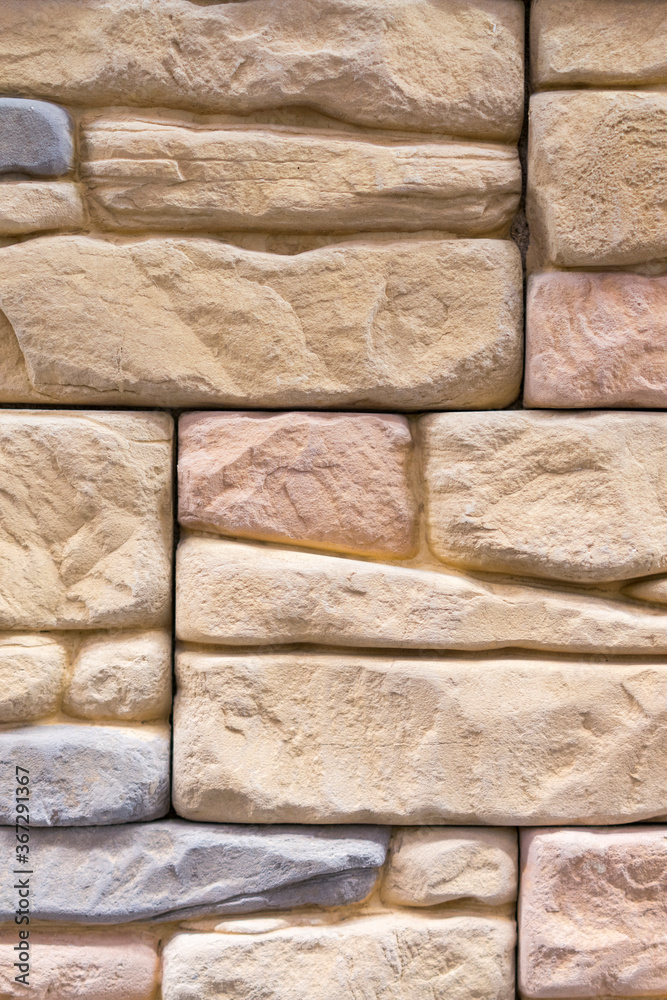 Stacked stone wall, natural stone cladding. Stone wall for background ...