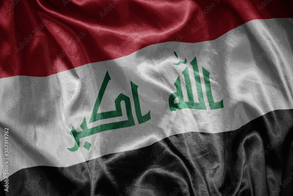 colorful shining big national flag of iraq on a silky texture Stock ...