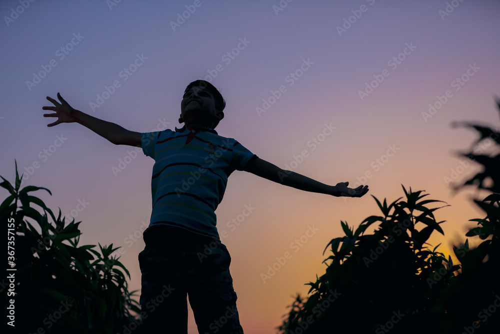Happy indian child jumping in air Stock Photo | Adobe Stock