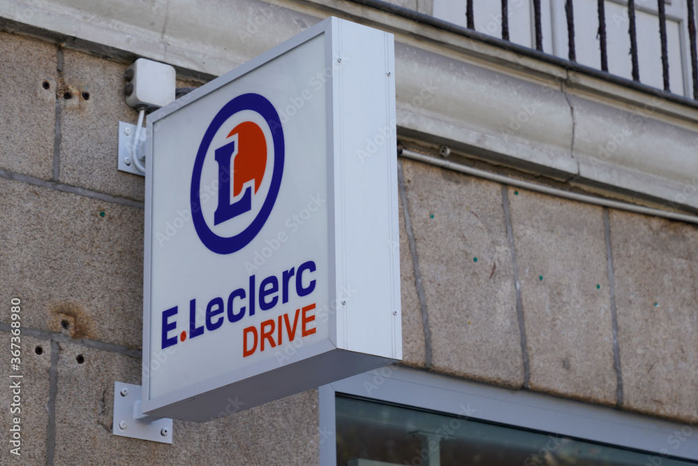 E.leclerc drive text logo and round sign on building facade of shop ...