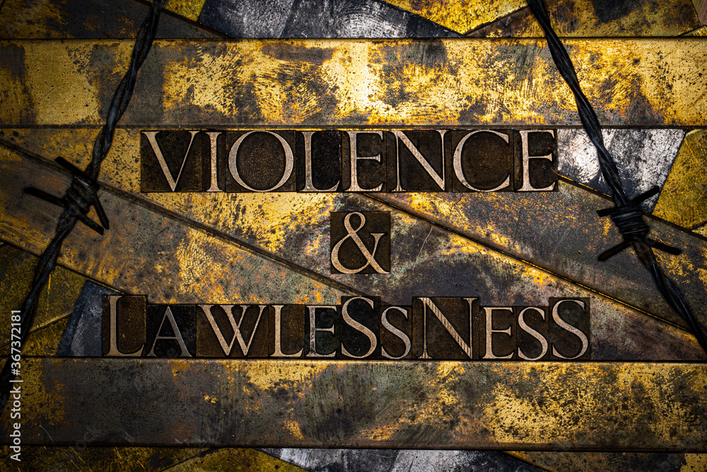 Violence and Lawlessness text formed with real authentic typeset ...