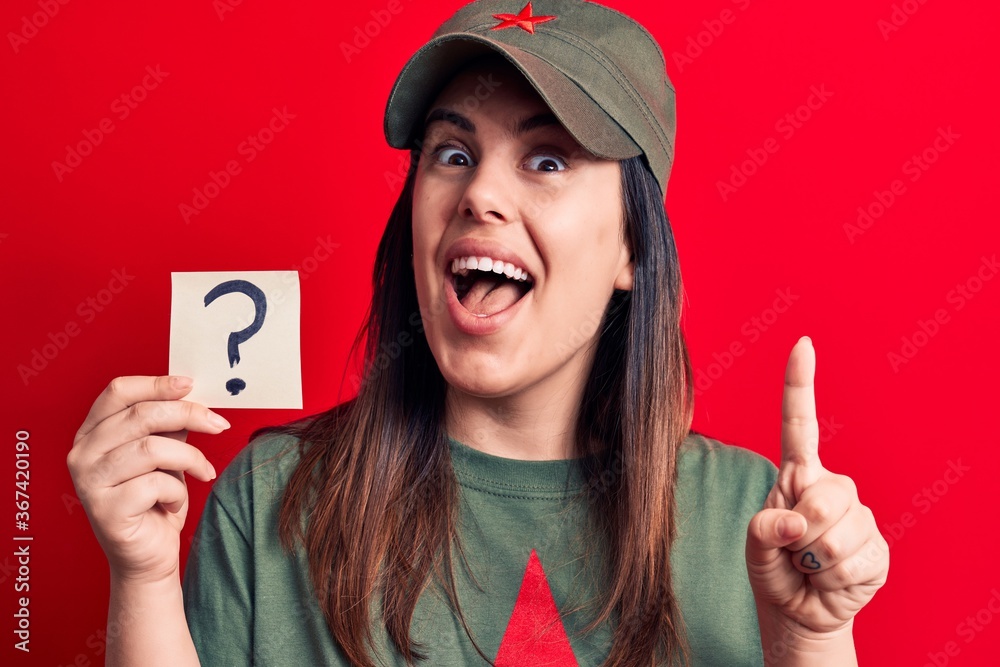 Beautiful woman wearing cap with red star communist symbol holding ...
