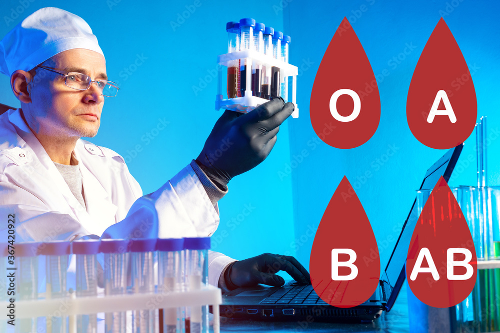 Red drops with blood group designations. The doctor examines the test ...