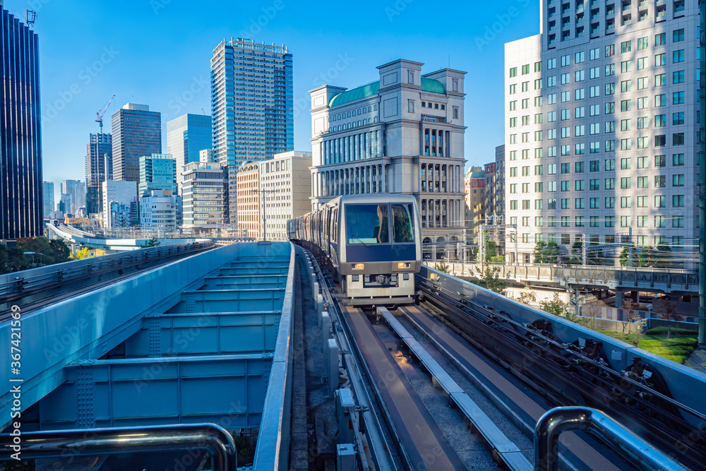Japan. Tokyo. Downtown. The train is close to office buildings ...