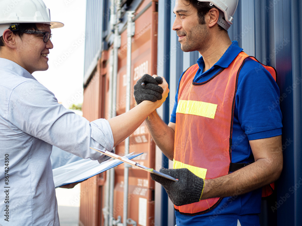 Businessmen ceo manager Customs Broker shake hand Shipper engineering ...