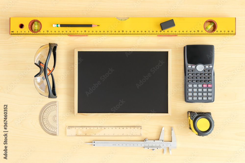 Top view engineer desk light brown wood texture have roll home plan and ...