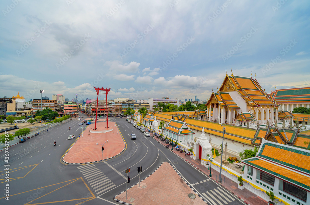 The Giant Swing or Sao Ching Cha monument with Wat Suthat temple at ...