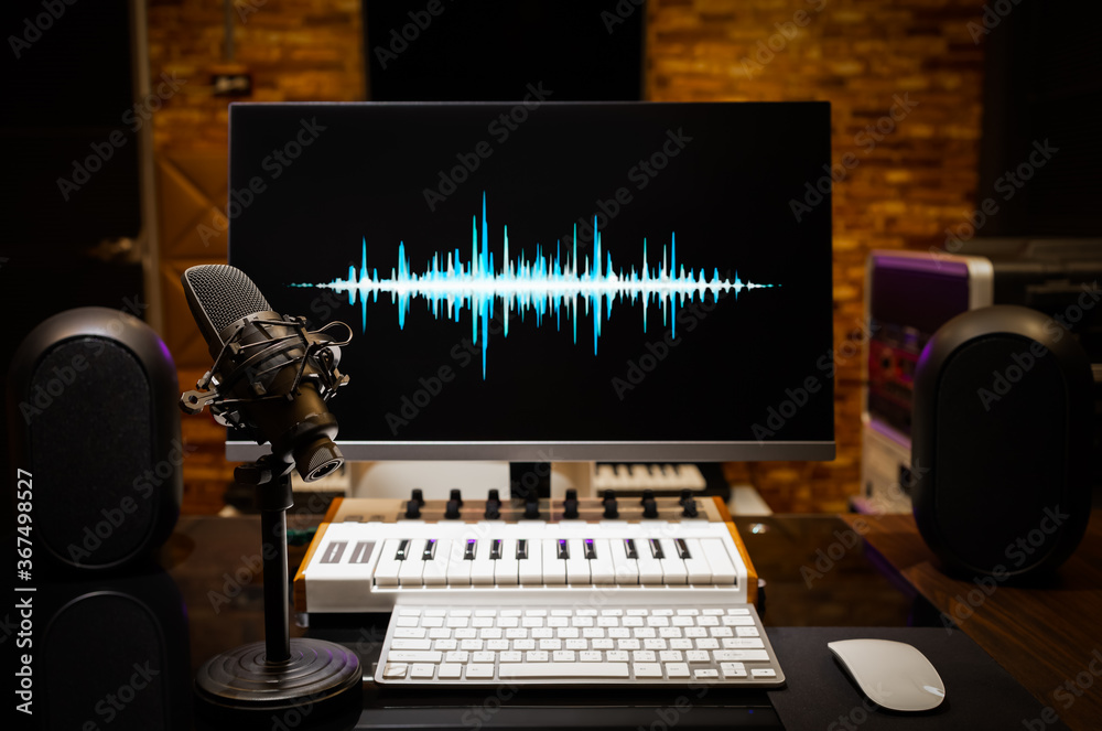 microphone and waveform on display. music production, broadcasting ...