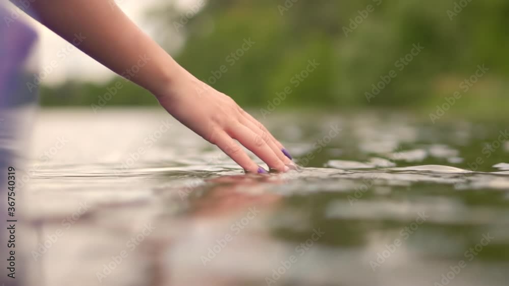 Hands Playing And Touching Water In Slow Motion.Dragging And Sliding ...