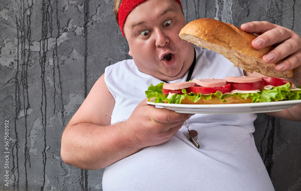 Wow fat man is surprised at a big sandwich, opens it and looks inside ...