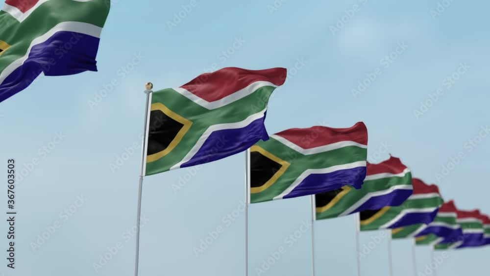Row of waving flags of National flags of South Africa with sky ...