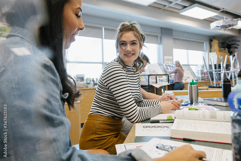 High school girl students studying in science laboratory classroom ...