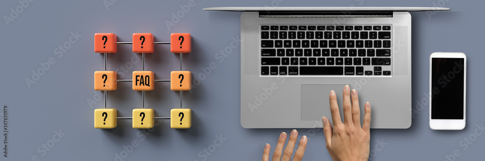 cube grid with text FAQ and question marks with office equipment on ...