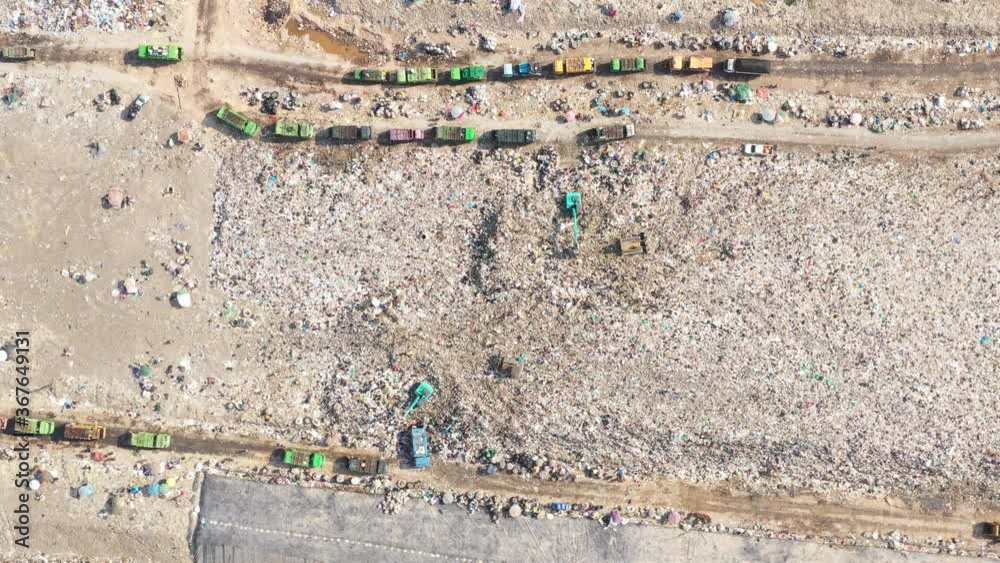 Aerial top view of A Huge Waste, garbage, dump, rubbish landfill. A ...