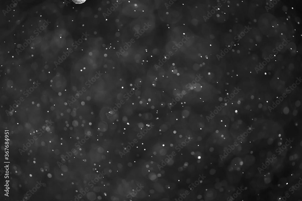 snow black background abstract texture, snowflakes falling in the sky ...