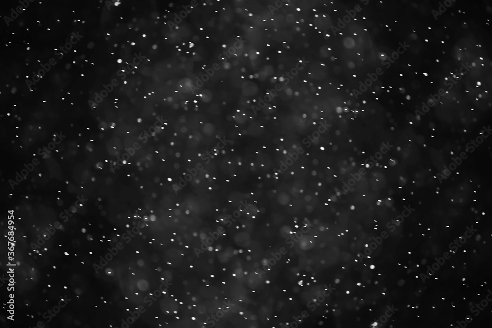 snow black background abstract texture, snowflakes falling in the sky ...