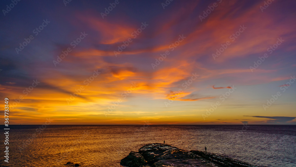 Bright sunset over the sea, Dramatic clouds and beautiful reflection ...