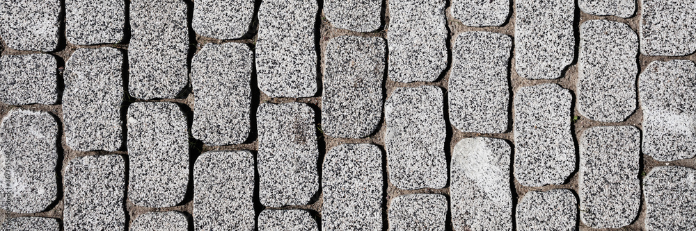 Granite pavement texture. Beautiful masonry with uneven granite blocks ...