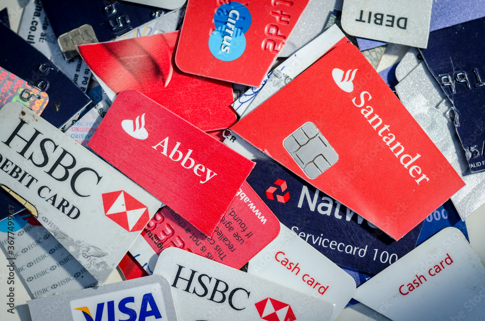 London, England - July 29, 2015: Cut Up Credit and Debit Cards, As the ...