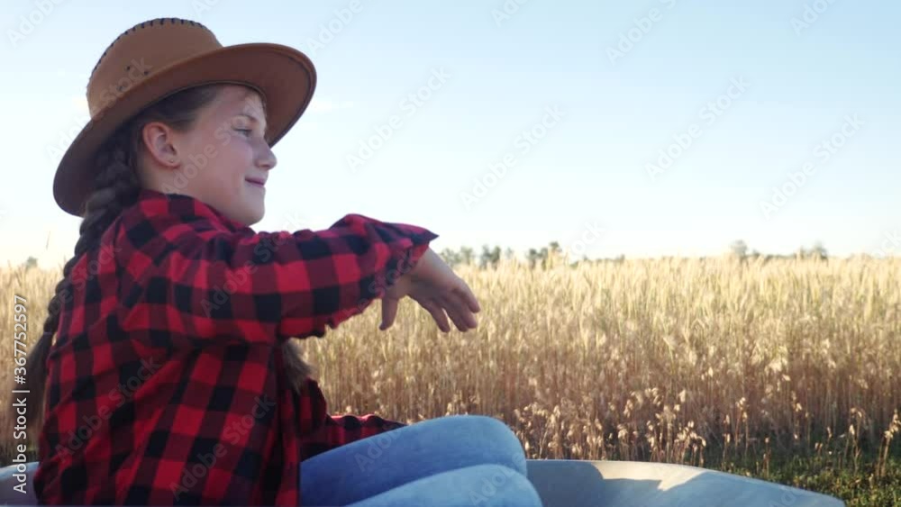 kid children sisters play with a garden trolley car ride on wheelbarrow ...