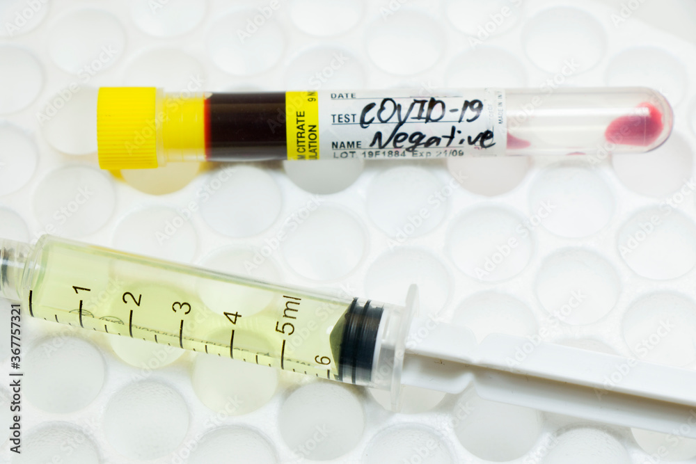 Medical needle and blood tube, corona virus or covid-19 vaccine. Stock ...