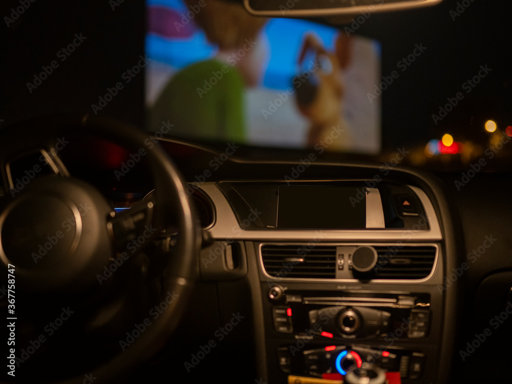 Stockfoto car interior in a drive-in movie watching, at night, leisure ...