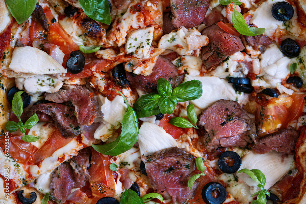 Meat Italian pizza with roast beef, chicken slices, melted cheese, red ...