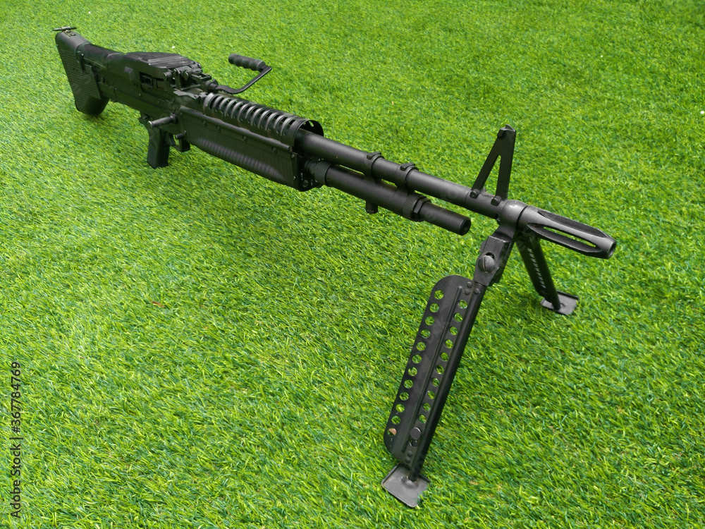 M60 military light machine gun with bipod weapon Stock Photo | Adobe Stock