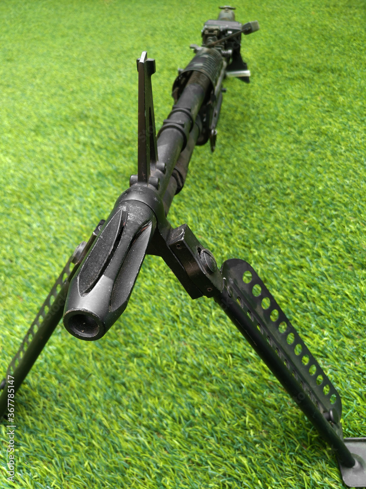 M60 military light machine gun with bipod weapon Stock Photo | Adobe Stock