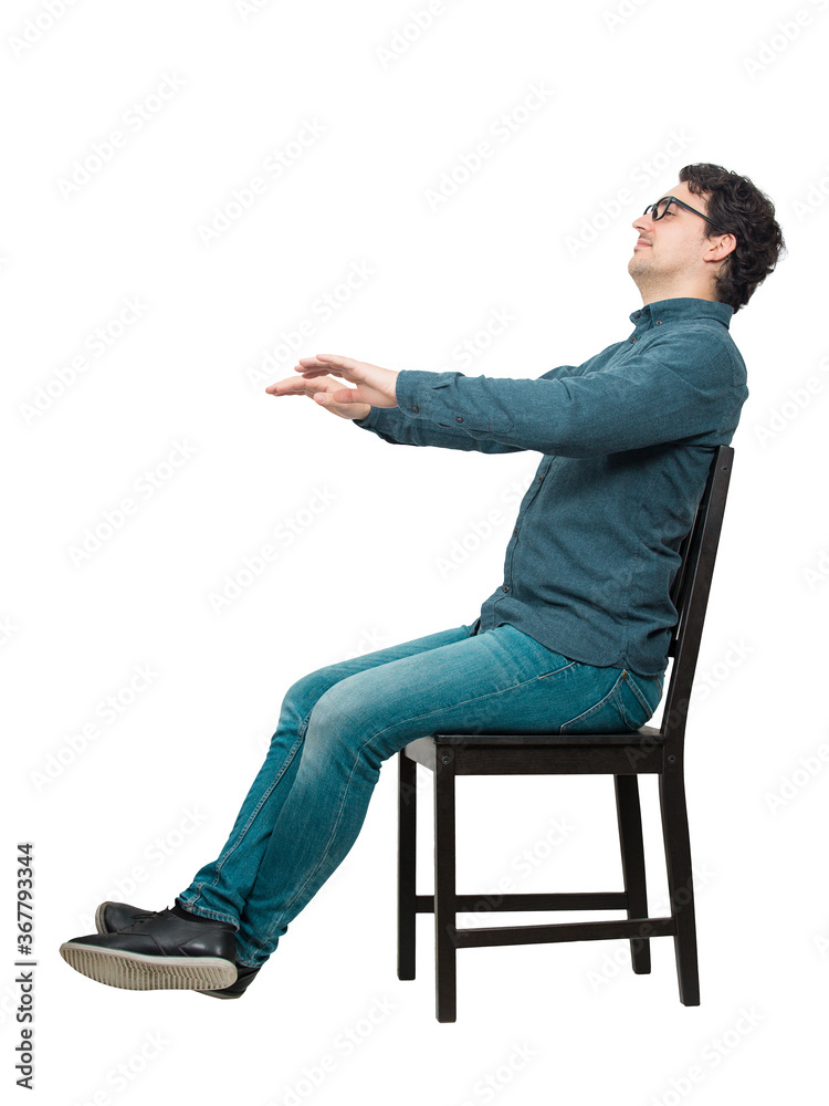 Side view full length portrait of cheerful businessman seated relaxed ...