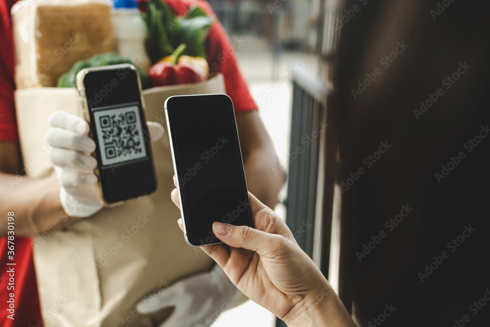 hand customer using digital mobile phone scan QR code paying for buying ...