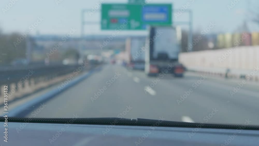 Car passing, bend to the right to exit ramp of highway in Europe ...