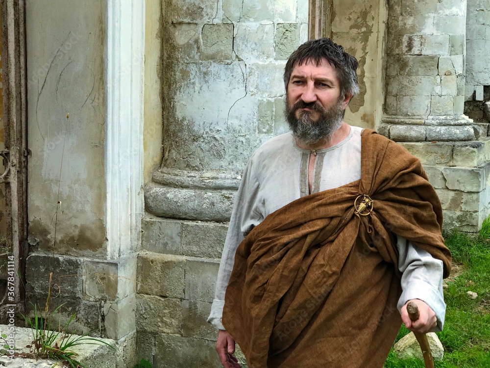Poster Actor in the guise of an ancient Greek philosopher on the set ...