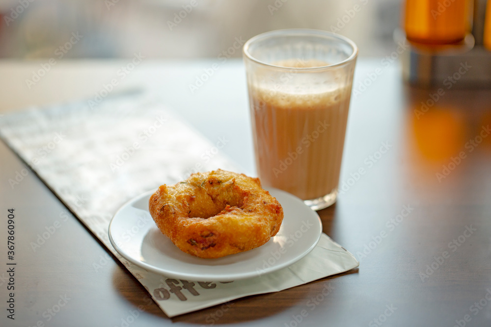 Milk tea with South Indian Vadai or Chai with vada. Stock Photo | Adobe ...