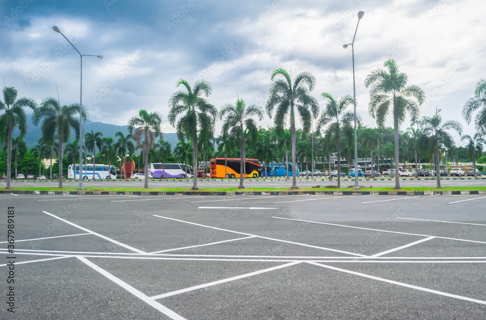 Wide empty asphalt parking lot background with yellow and white painted ...