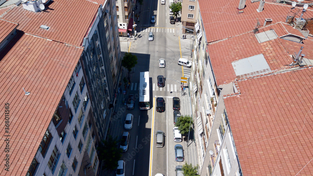 Aerial view of the crosswalk and road junction between buildings at the ...