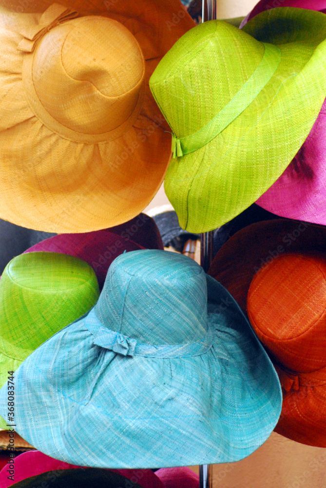 FASHION- Display of Colorful Sun Hats in France Stock Photo | Adobe Stock