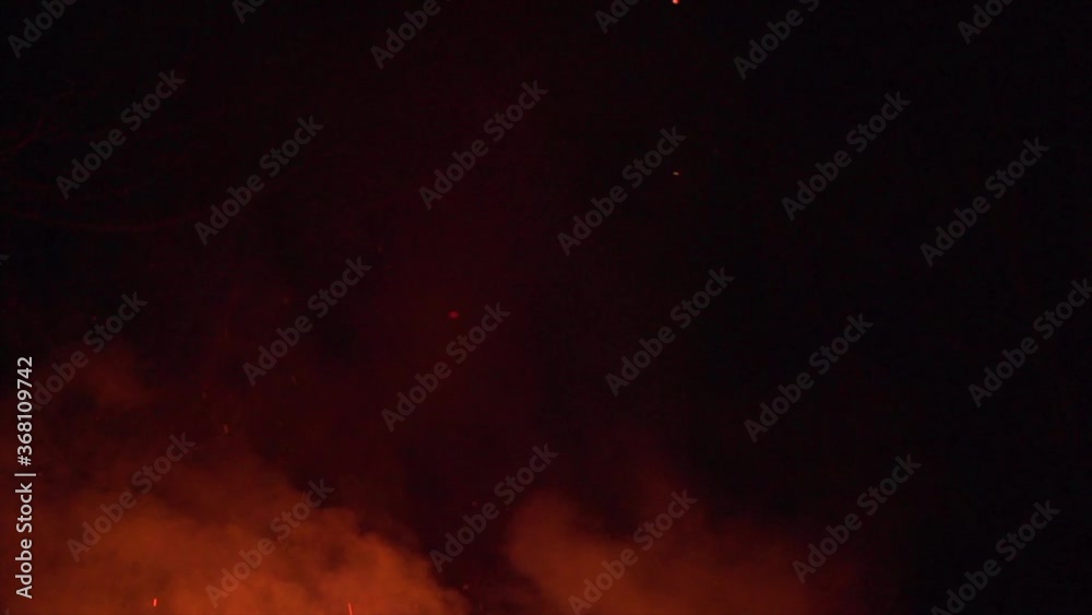 Burning fire. Fire flames with flying sparks background. Firestorm ...