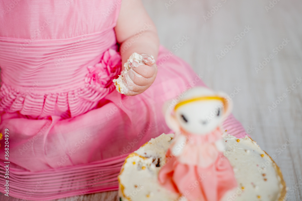 Crash pink cake at the celebration of the first birthday of the girl ...