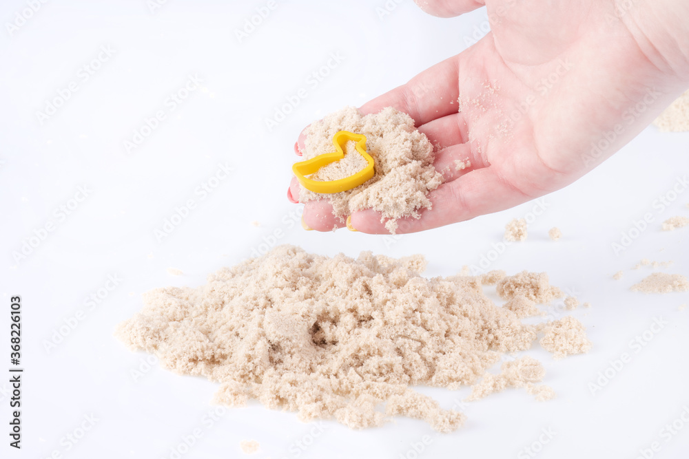 Sand on your hand, play with sand Stock Photo | Adobe Stock