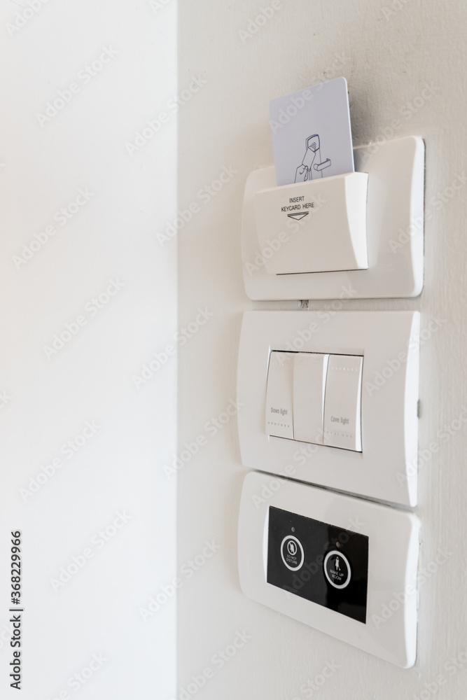 Electronic Keycard holder insert in hotel room. Concept for resort and ...