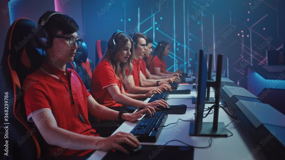 Diverse Esport Team of Pro Gamers Play in Mock-up RPG Strategy Video ...