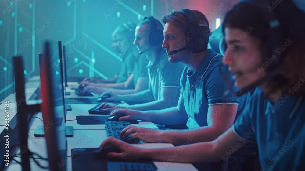Diverse Esport Team of Pro Gamers Play in Computer Video Game and Win ...