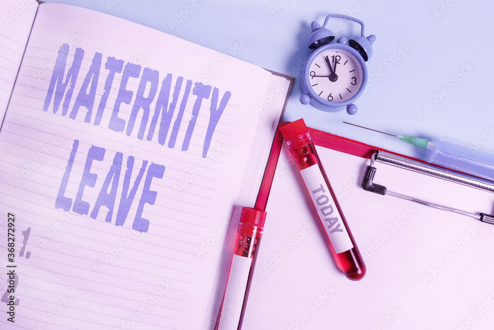 Writing note showing Maternity Leave. Business concept for a leave of ...