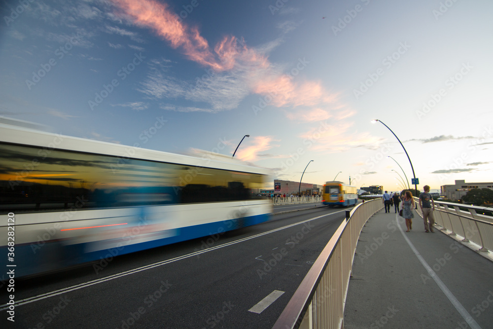 blurry bus travelling on a bridge Stock Photo | Adobe Stock