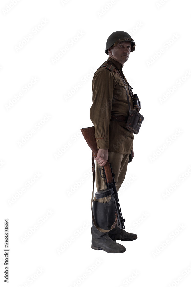 Male actor in the uniform of an officer and a helmet of the Soviet Army ...